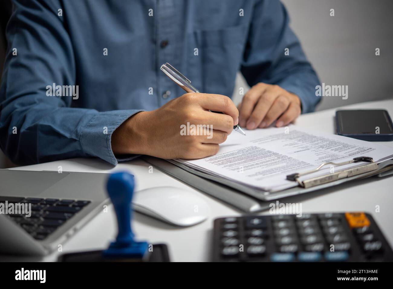 Business person Writing contract law and paper work for business and ...