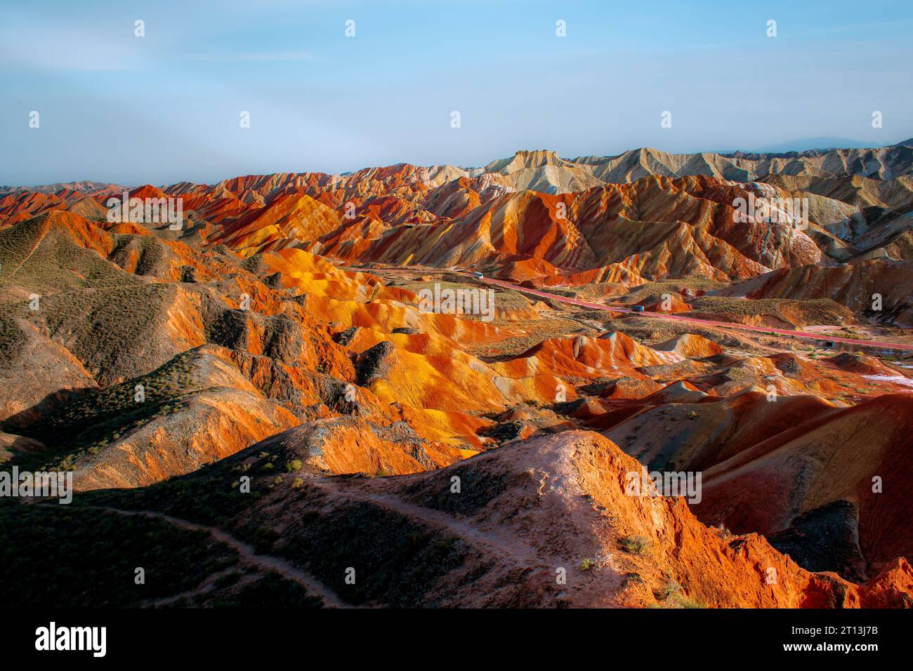 The way through the rainbow Colorful rock formations in the Zhangye ...