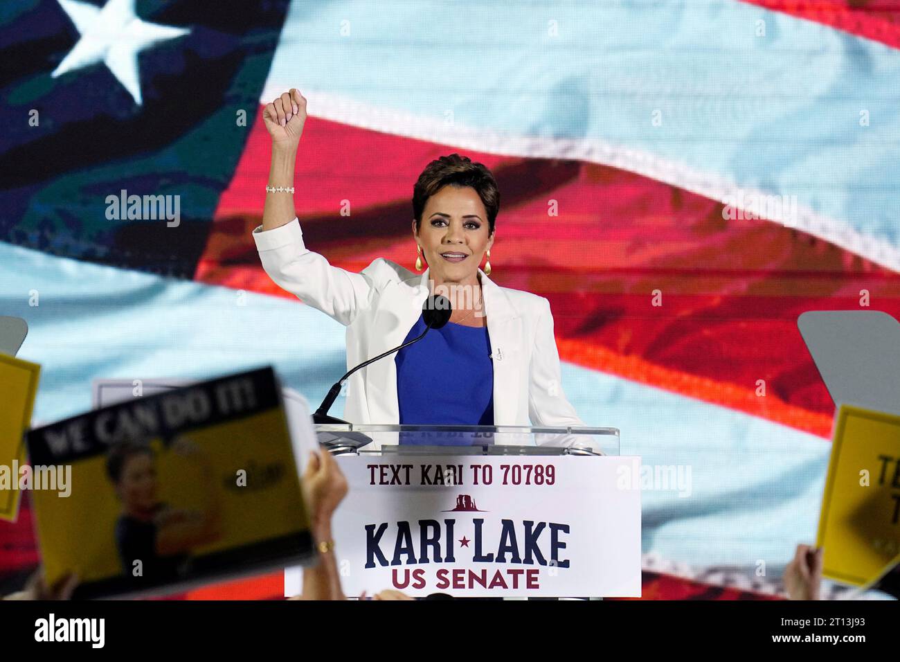 Republican candidate Kari Lake waves to supporters as she announces her ...