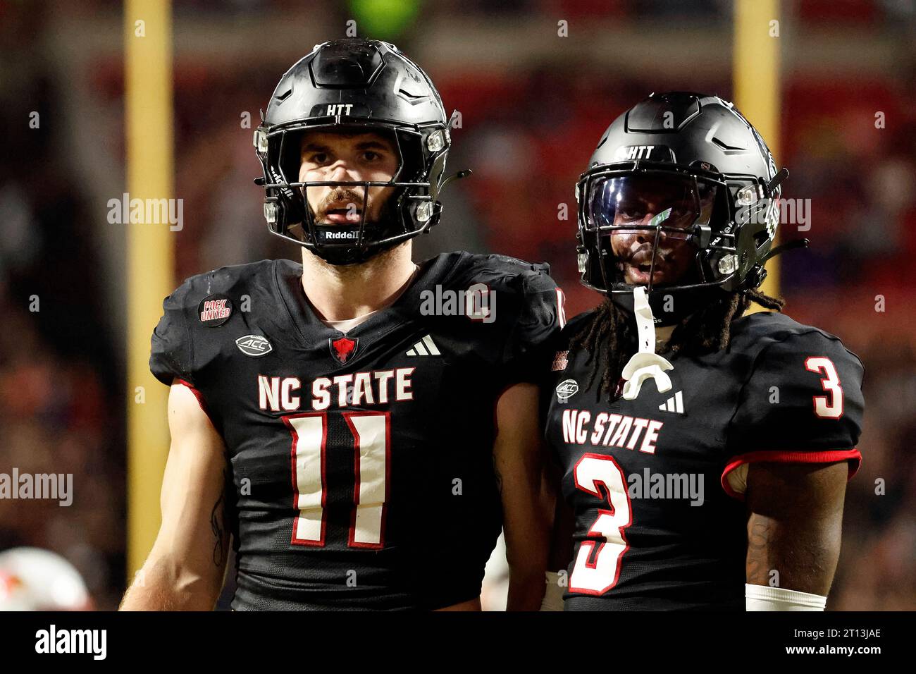 North Carolina State linebacker Payton Wilson (11) and cornerback Aydan ...