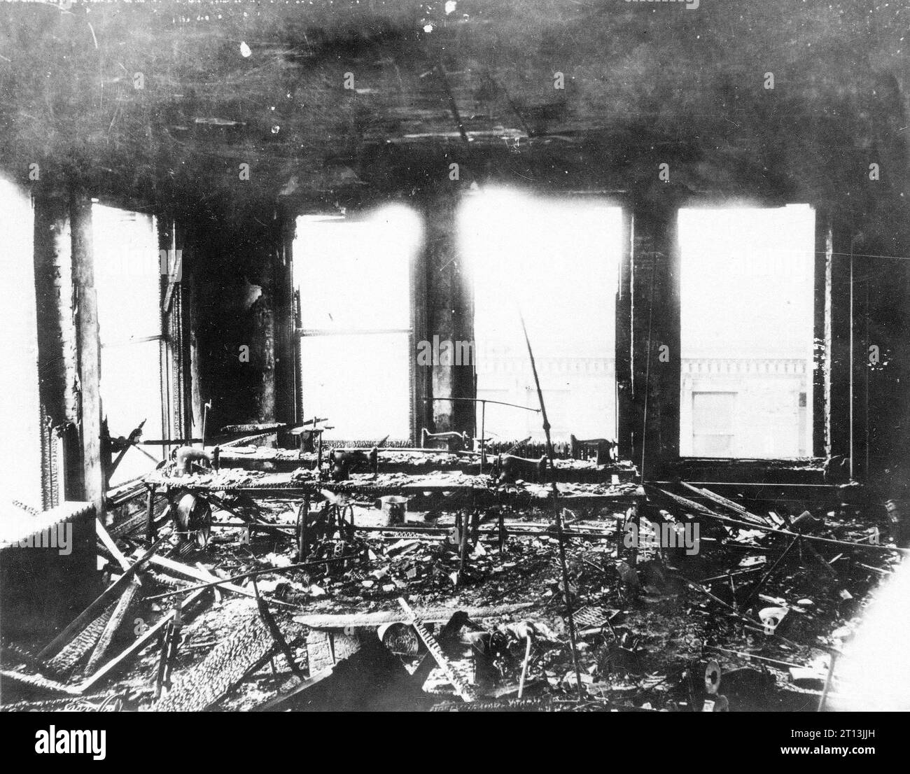 FILE - This March 1911 photo shows fire debris in a burned-out room of ...