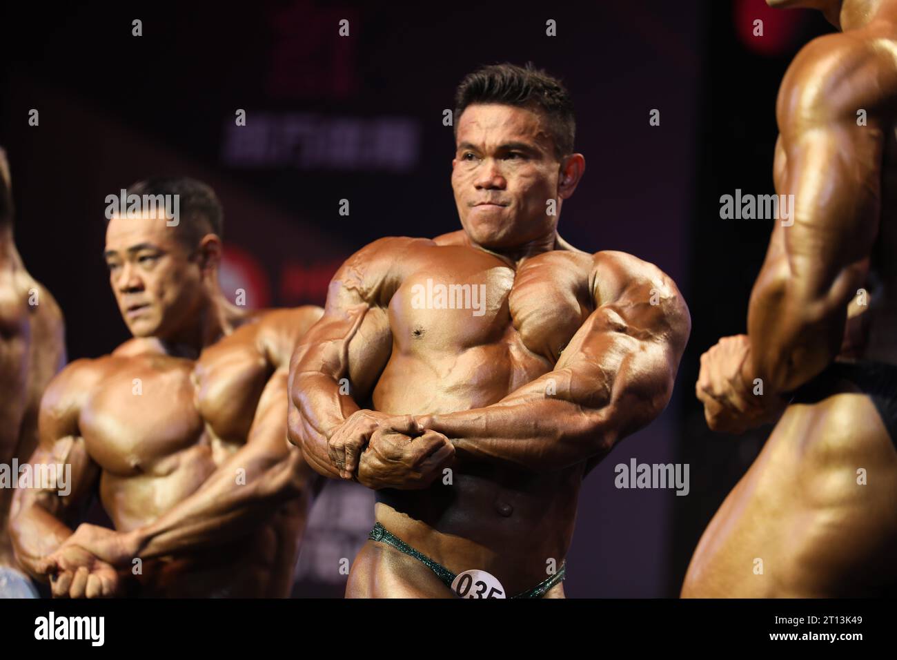 Bodybuilders take part in a fitness competition in Tai'an City, east ...