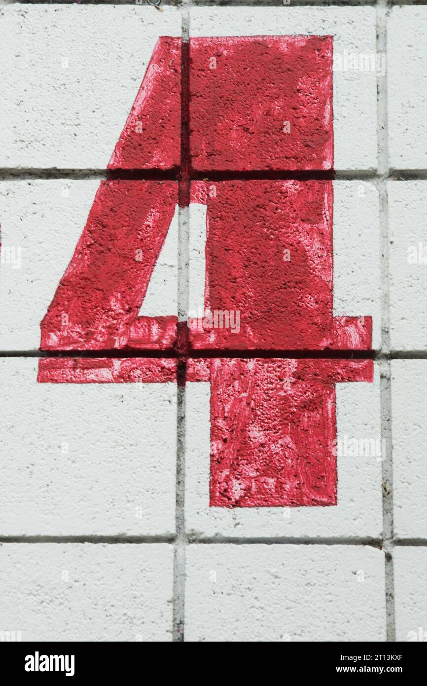 Faded number 4 showing all its character of age, wear & usefulness ...