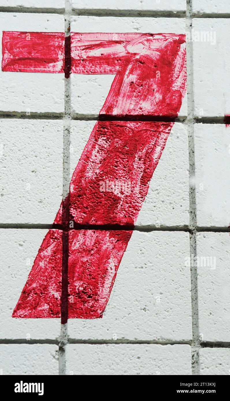 Faded number 7 showing all its character of age, wear & usefulness ...