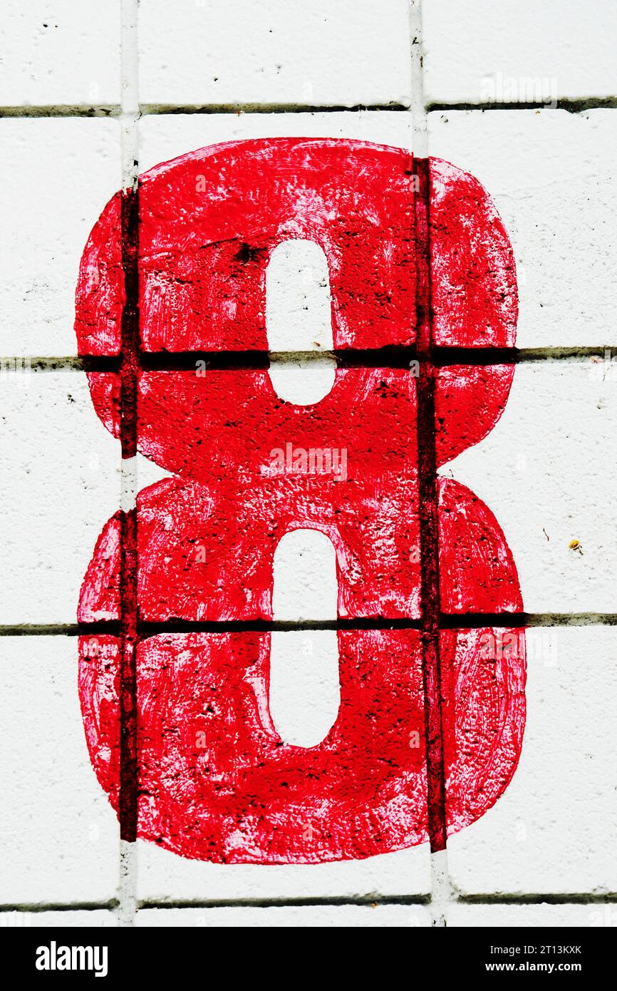 Faded number 8 showing all its character of age, wear & usefulness ...