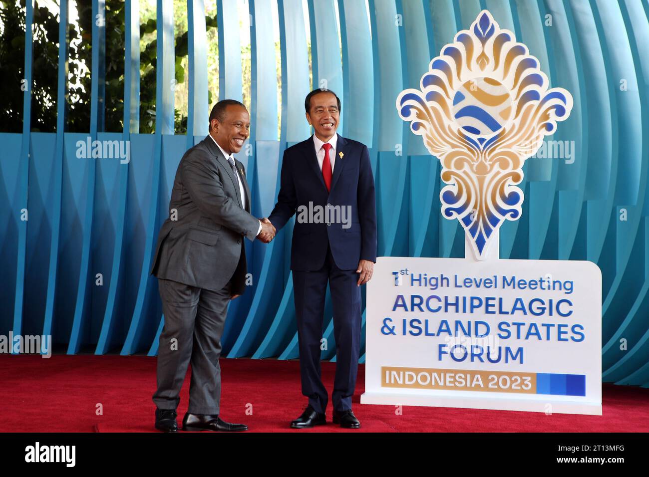 Indonesian President Joko Widodo, right, greets Sao Tome and Principe ...