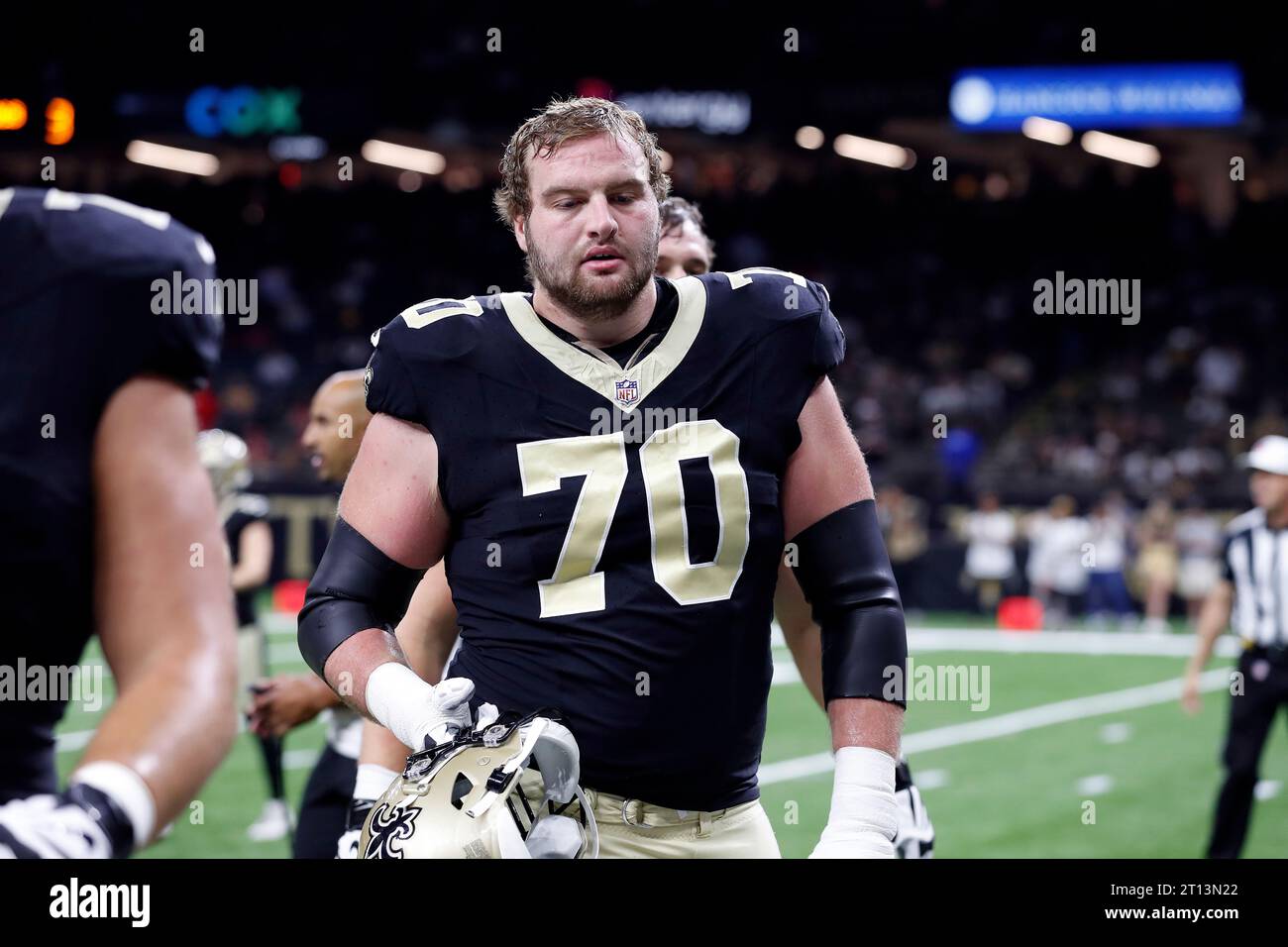 New Orleans Saints offensive tackle Trevor Penning (70) warms up before ...