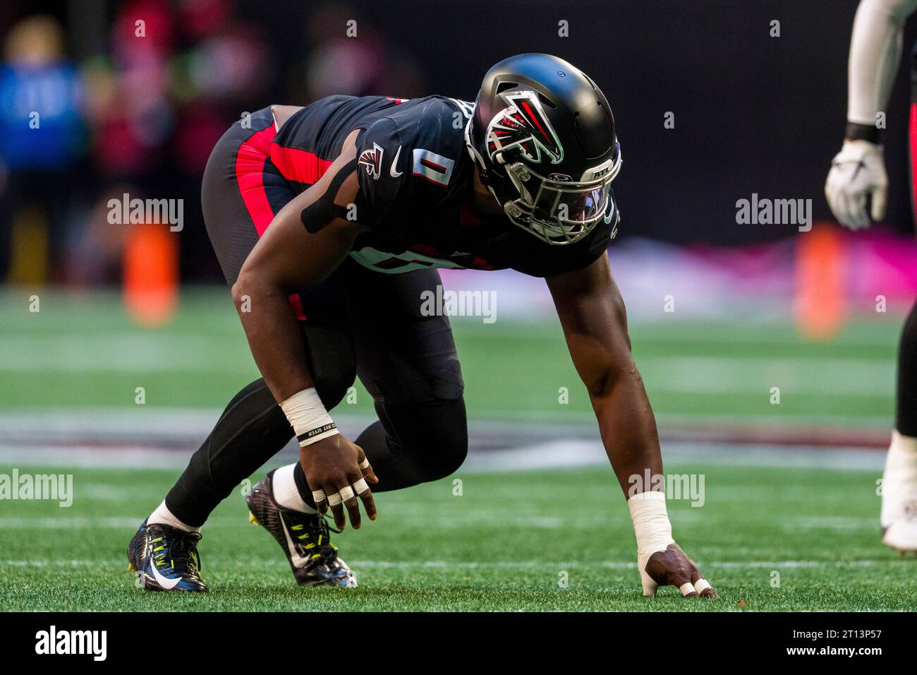 Atlanta Falcons linebacker Lorenzo Carter (0) lines up during the first ...