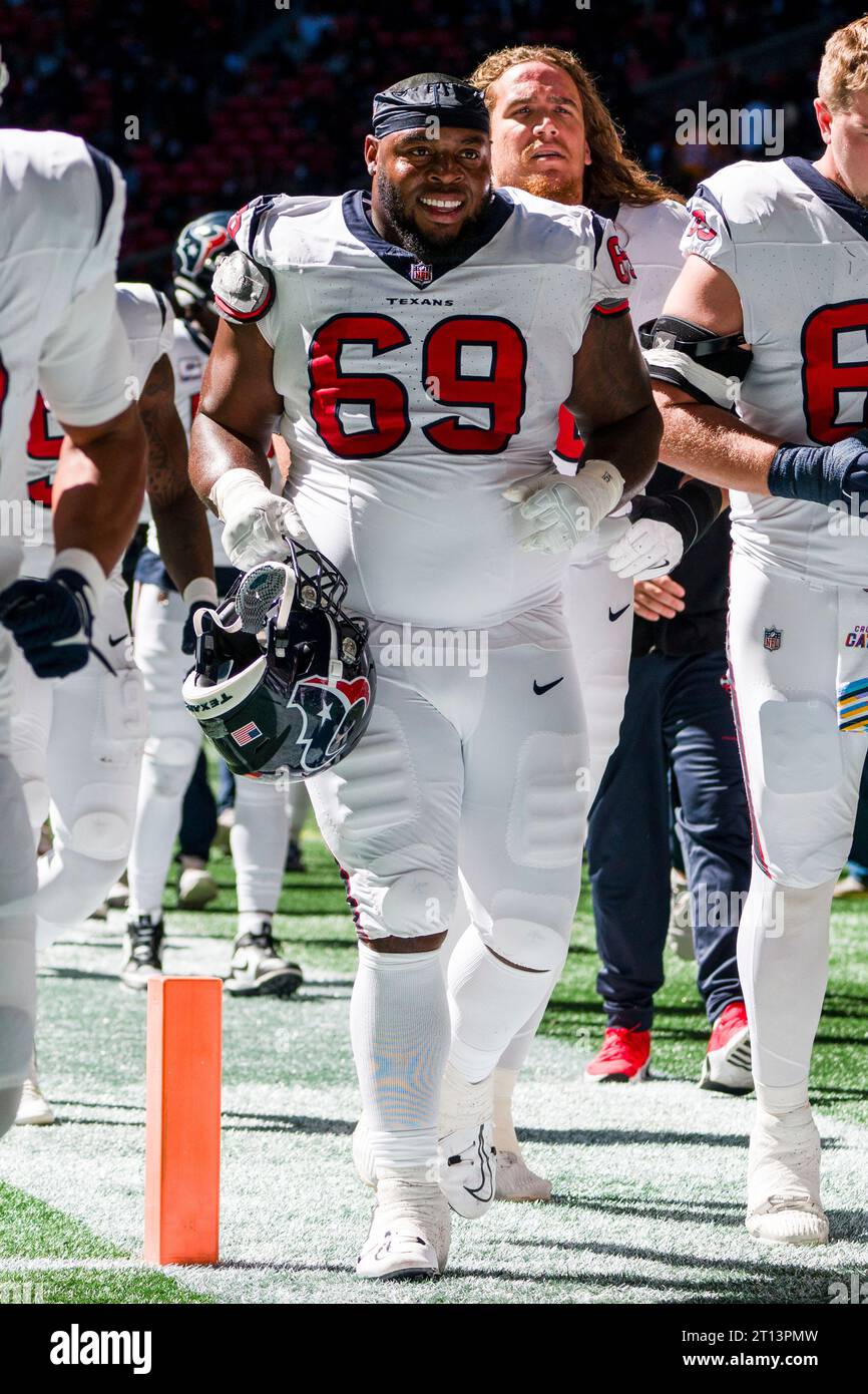 Houston Texans guard Shaq Mason (69) runs off the field after the first ...