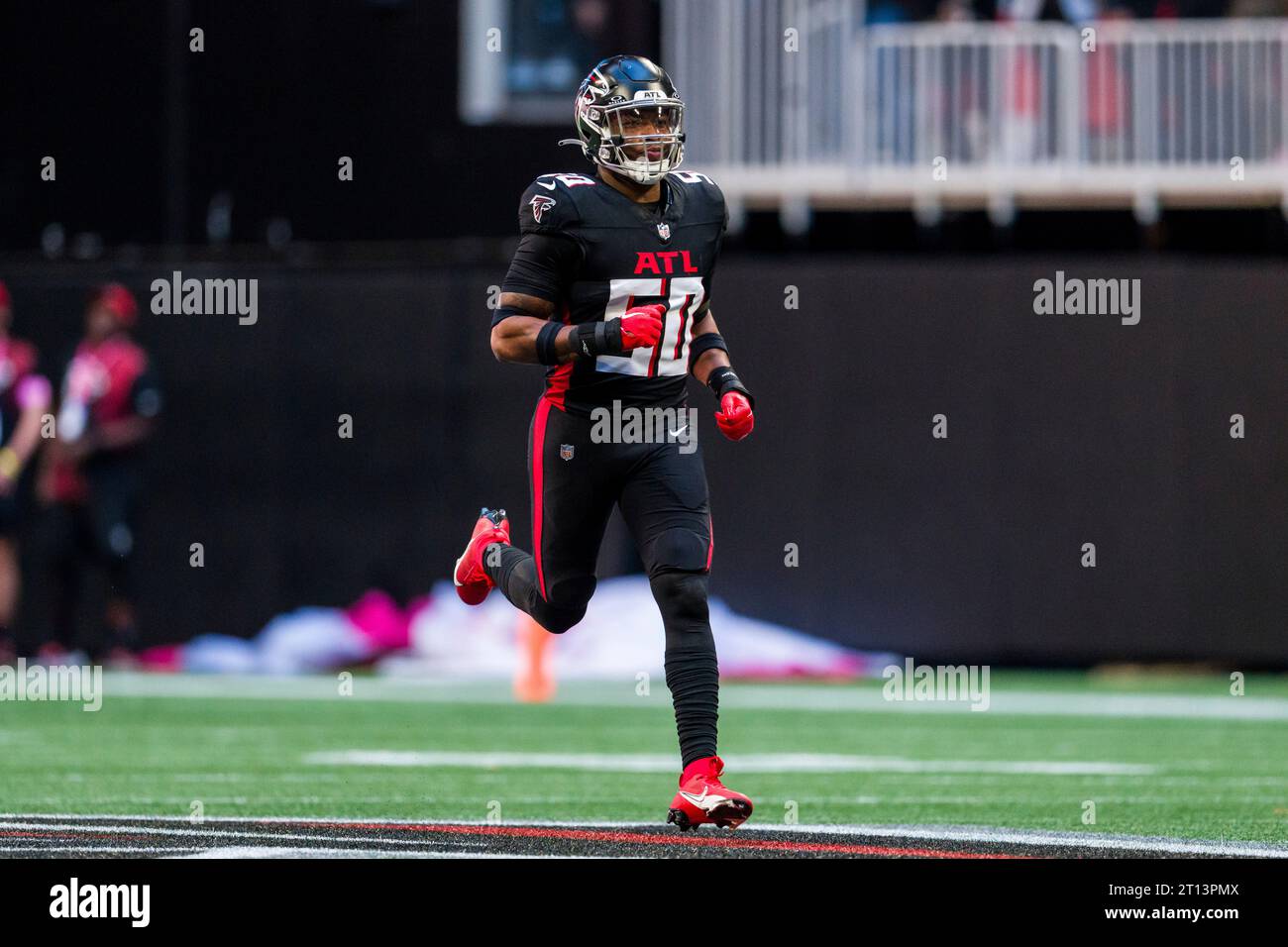 Atlanta Falcons linebacker Tae Davis (50) works during the second half ...