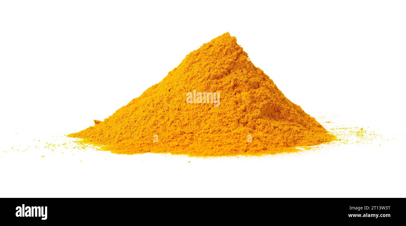 Heap of turmeric powder isolated on white background Stock Photo - Alamy