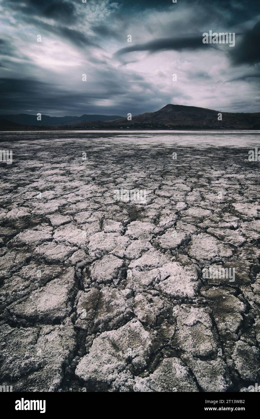 drought earth and dramatic sky with clouds Stock Photo - Alamy