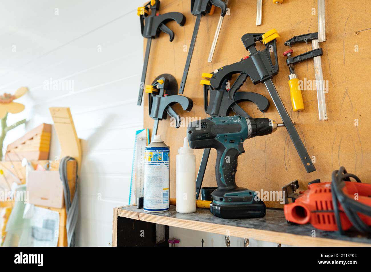 Set of tools in the workshop close up Stock Photo - Alamy