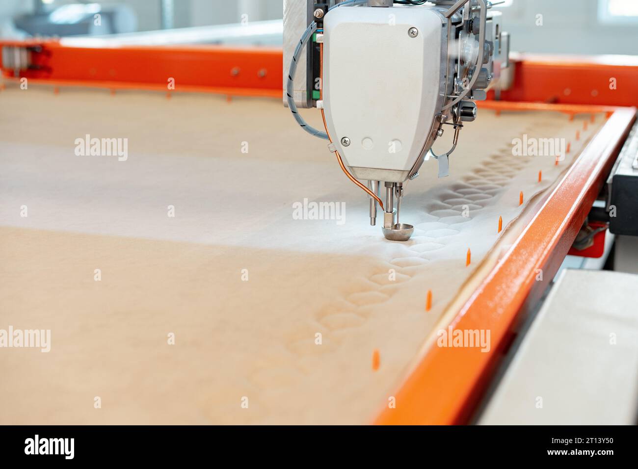 Automatic industrial sewing machine for stitching fabric Stock Photo ...