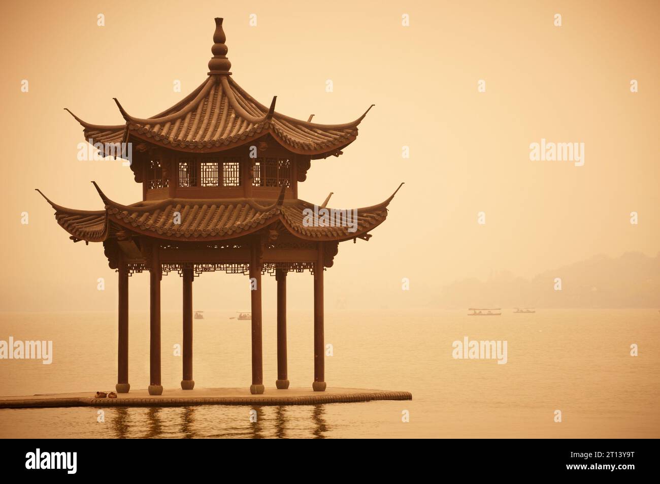 Chinese traditional wooden gazebo on the coast of West Lake, public ...