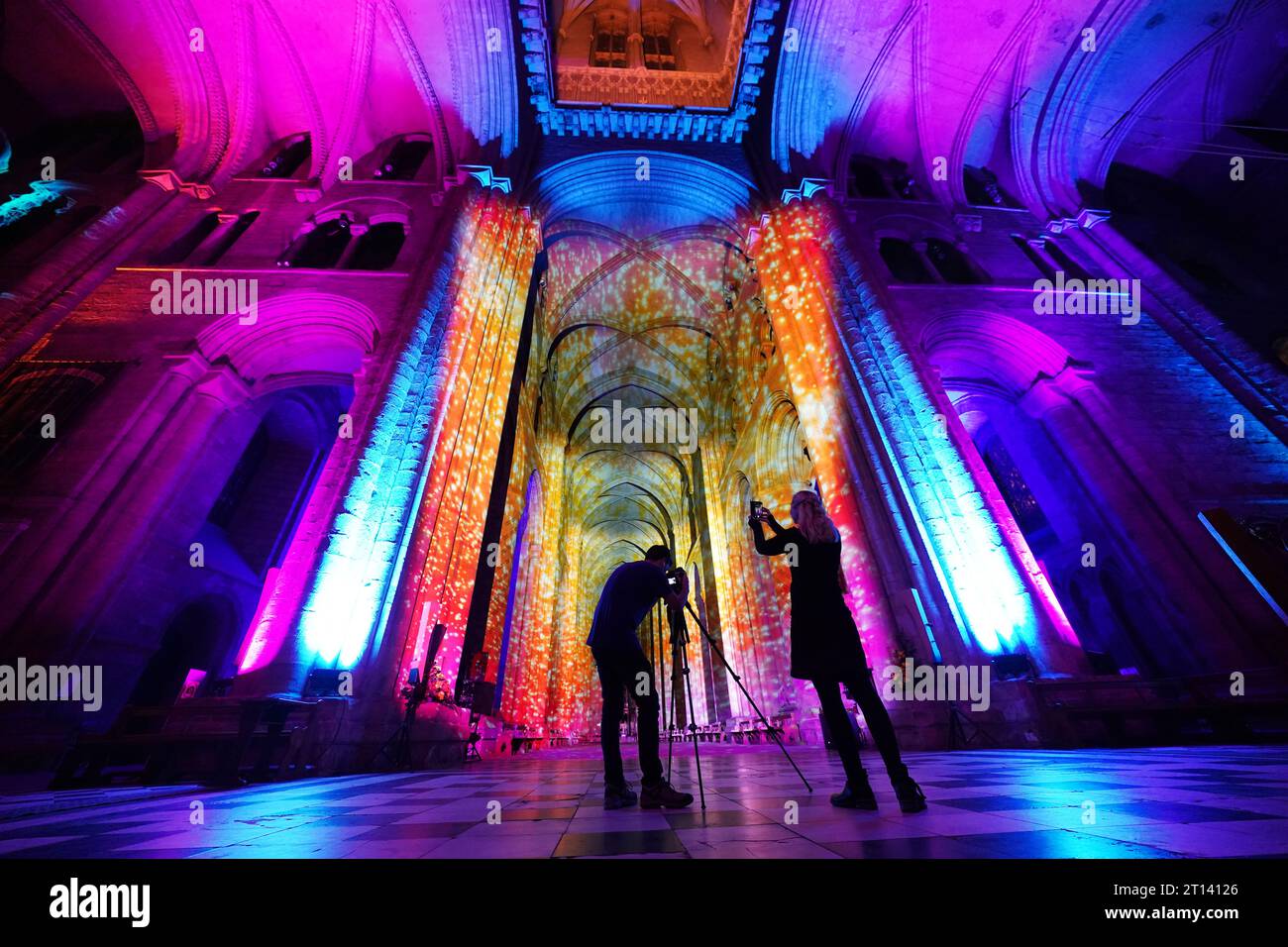 People viewing the rehearsal for the light show Luxmurals by artist ...