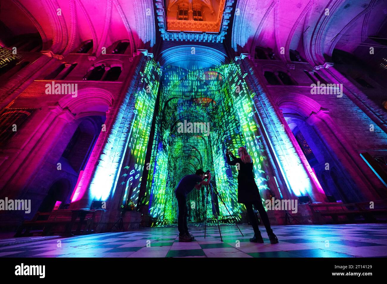 People viewing the rehearsal for the light show Luxmurals by artist ...