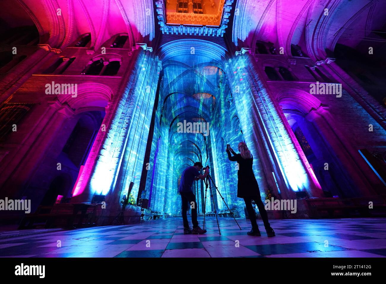 People viewing the rehearsal for the light show Luxmurals by artist ...