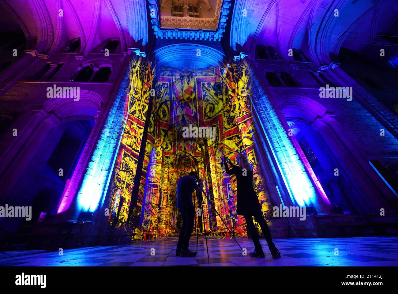 People viewing the rehearsal for the light show Luxmurals by artist ...