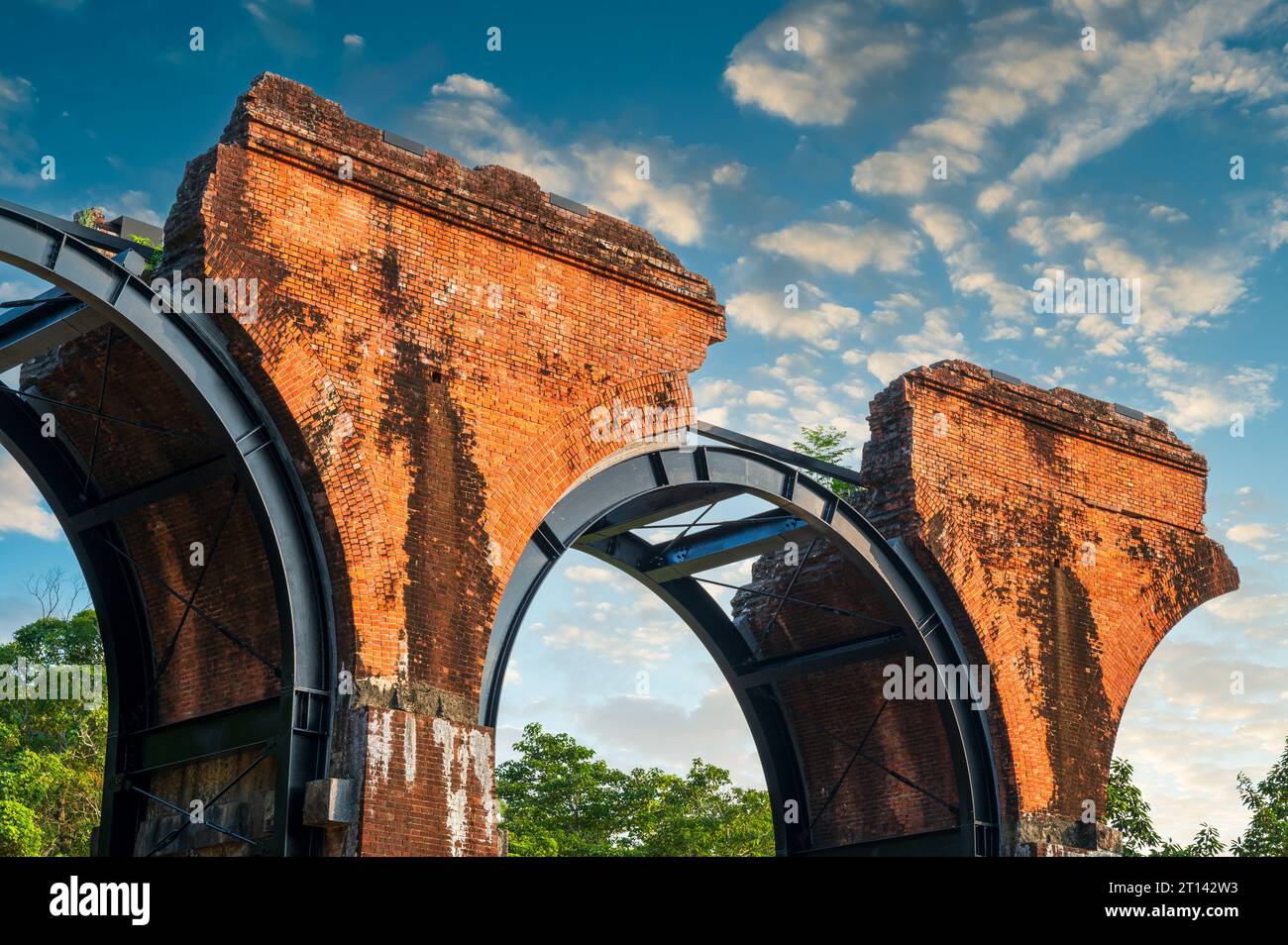 Red Brick arches at both ends are combined with a central steel truss ...
