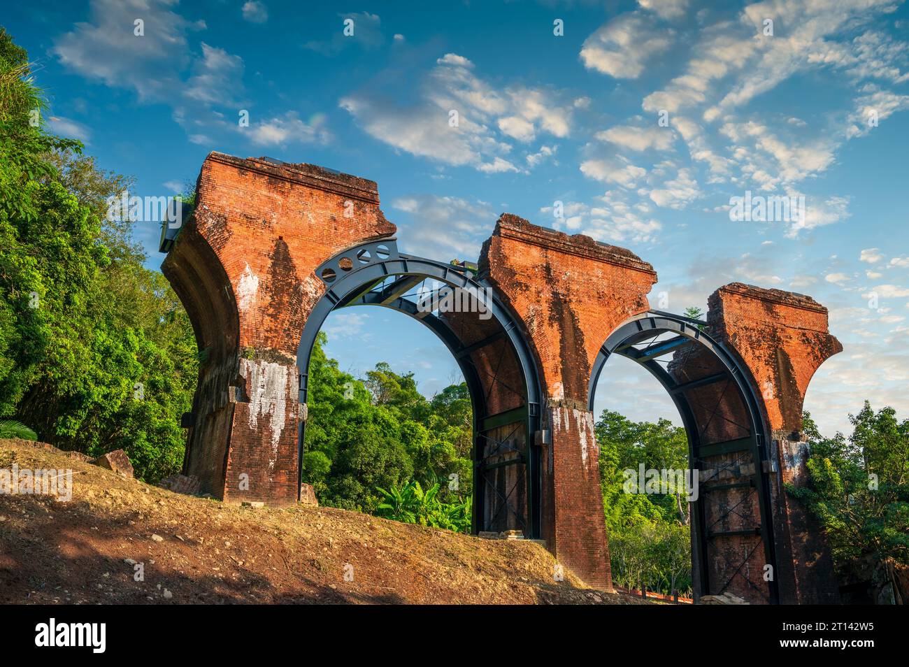 Red Brick arches at both ends are combined with a central steel truss ...