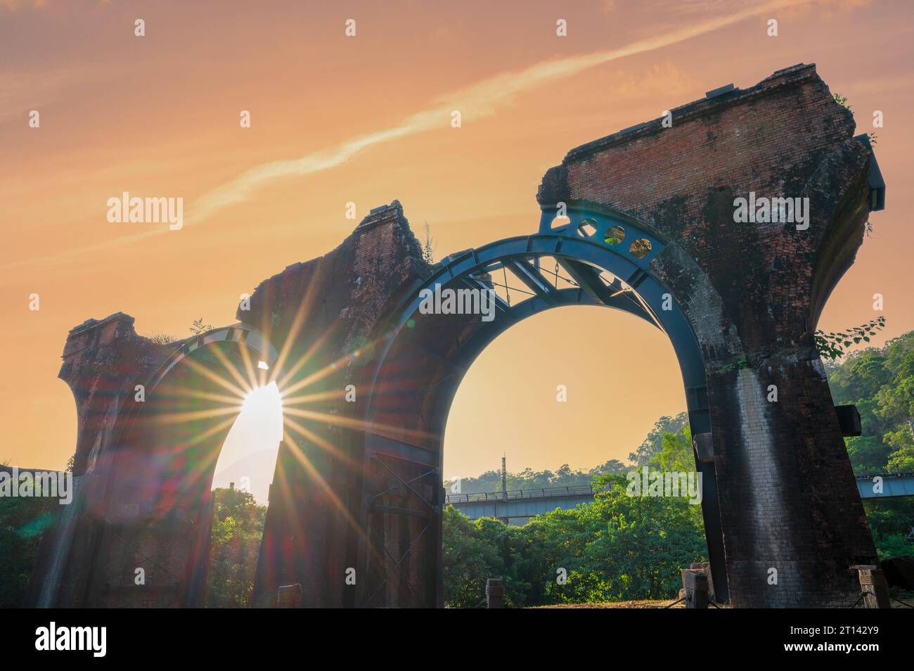 Red Brick arches at both ends are combined with a central steel truss ...