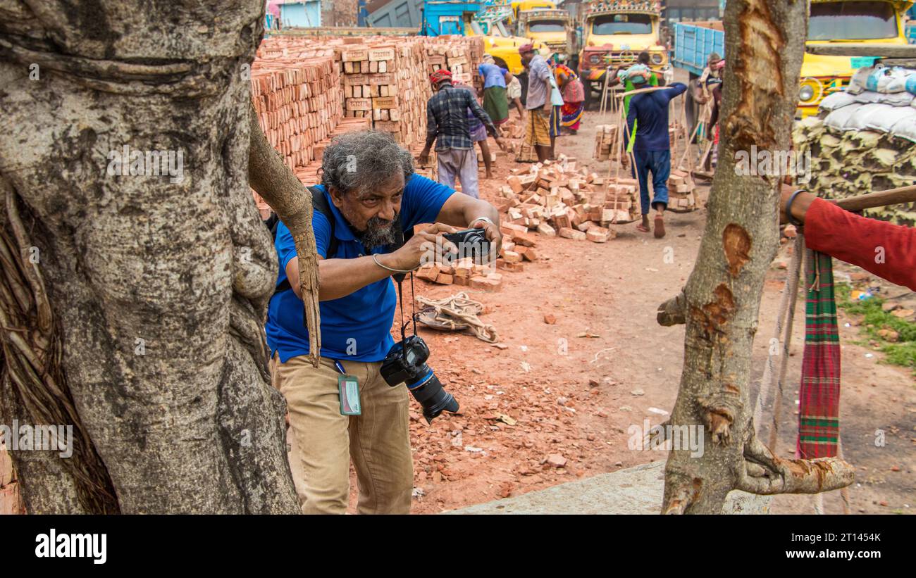 People offloading bricks from the boat, the image captured on May 29 ...
