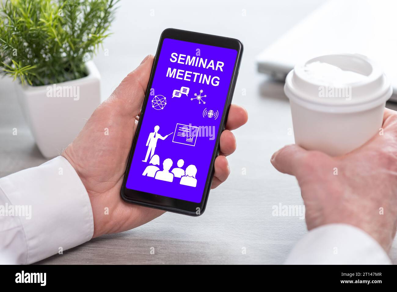 Smartphone screen displaying a seminar meeting concept Stock Photo - Alamy