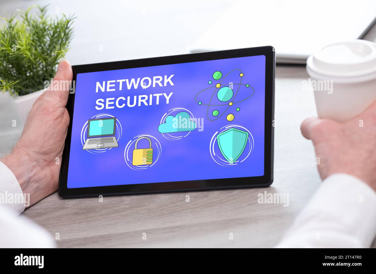 Tablet screen displaying a network safety concept Stock Photo - Alamy