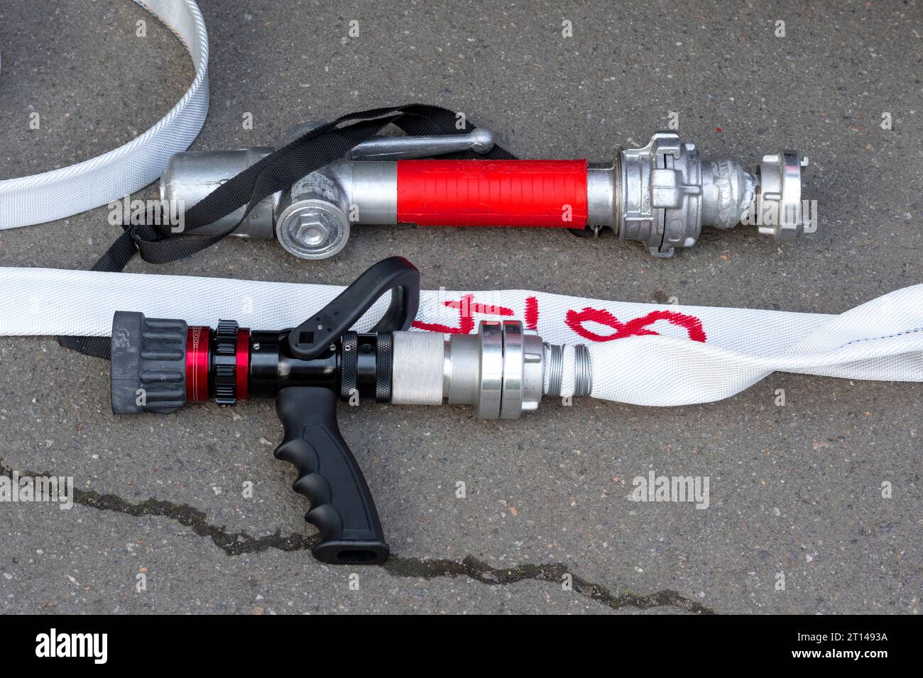 Fire hose. tools for fire extinguishing. close-up hose to extinguish ...