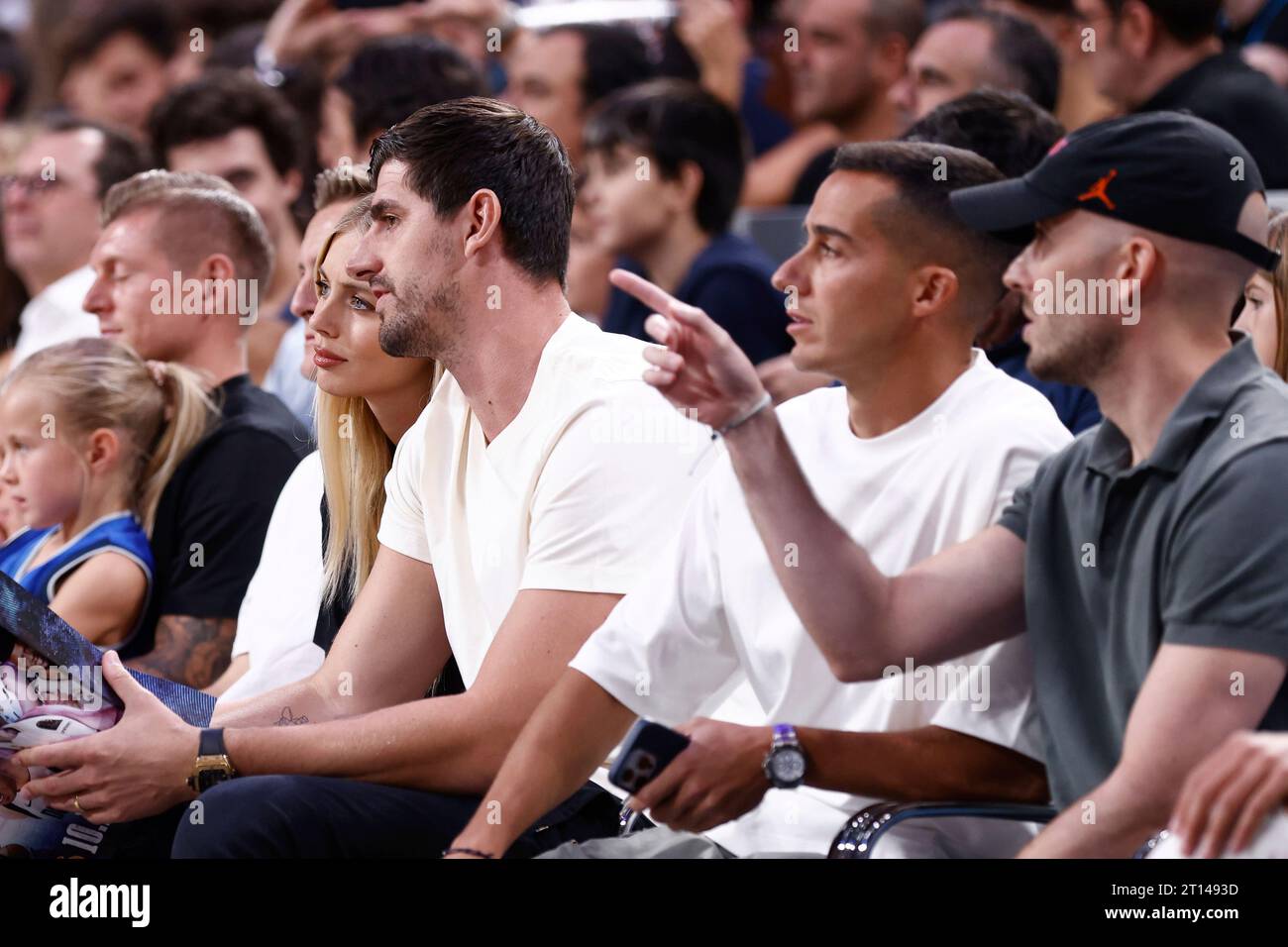 Mishel Gerzig and Thibaut Courtois of Real Madrid are seen during the ...