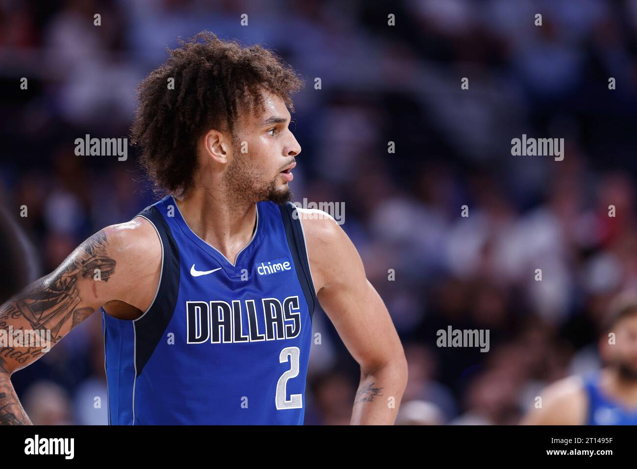 Dereck Lively II of Dallas Mavericks looks on during the basketball ...