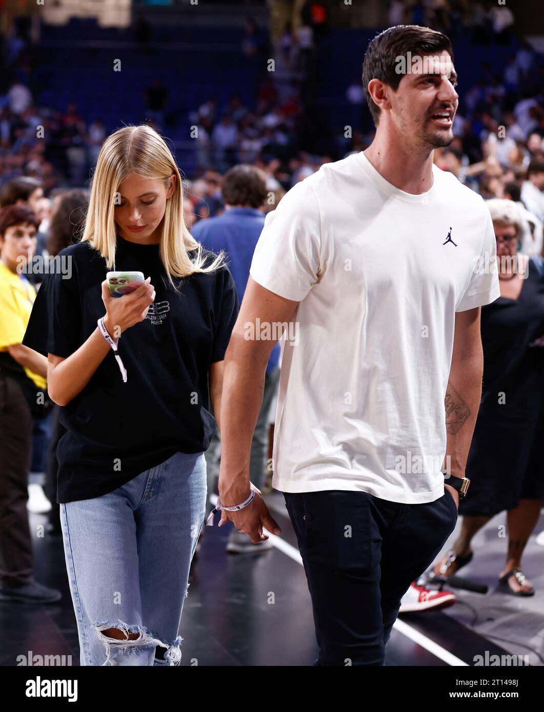 Mishel Gerzig and Thibaut Courtois of Real Madrid are seen during the ...