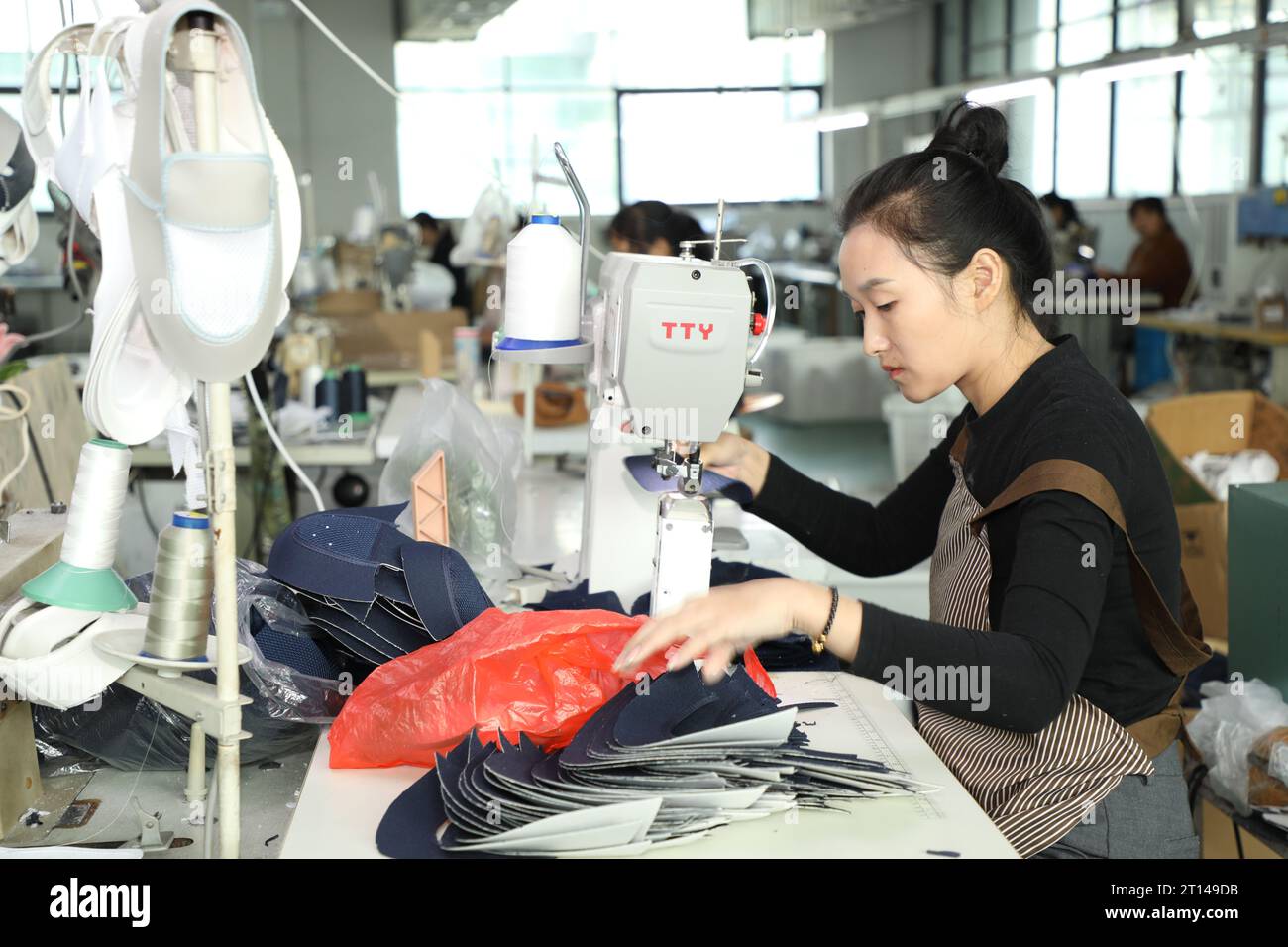 Shoe processing hi-res stock photography and images - Alamy