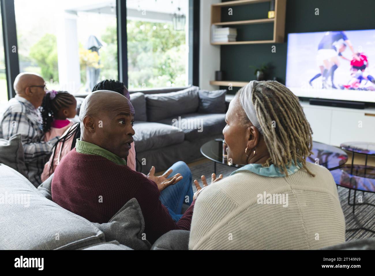 Excited african american parents, son, daughter and grandparents ...