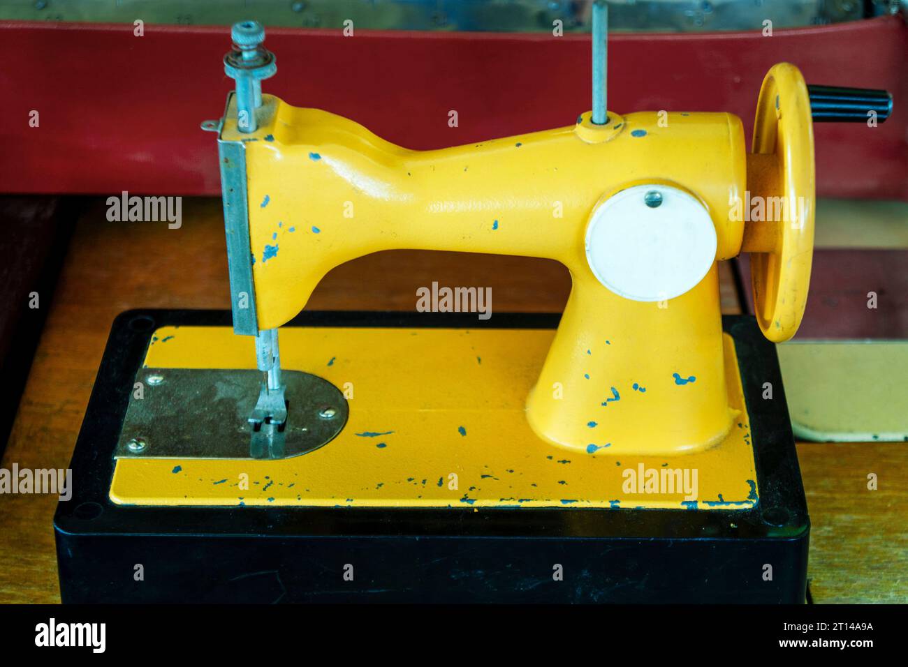 Old vintage yellow sewing machine . Antique Sewing Machine Stock Photo ...