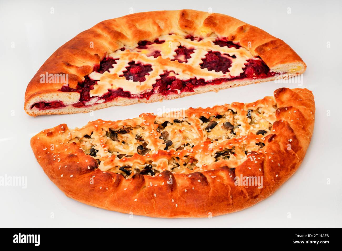 Fruit homemade pie. delicious dried fruit cake sliced. Baked braided ...