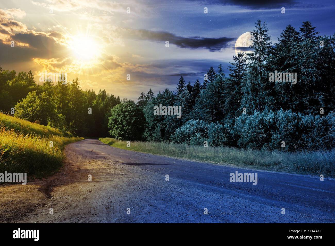 asphalt road with cracks turns right, passes through green shaded ...