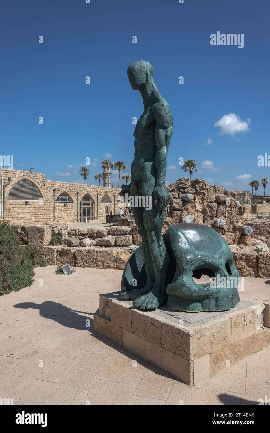 A majestic bronze statue atop a stone plinth in the Caesarea National ...