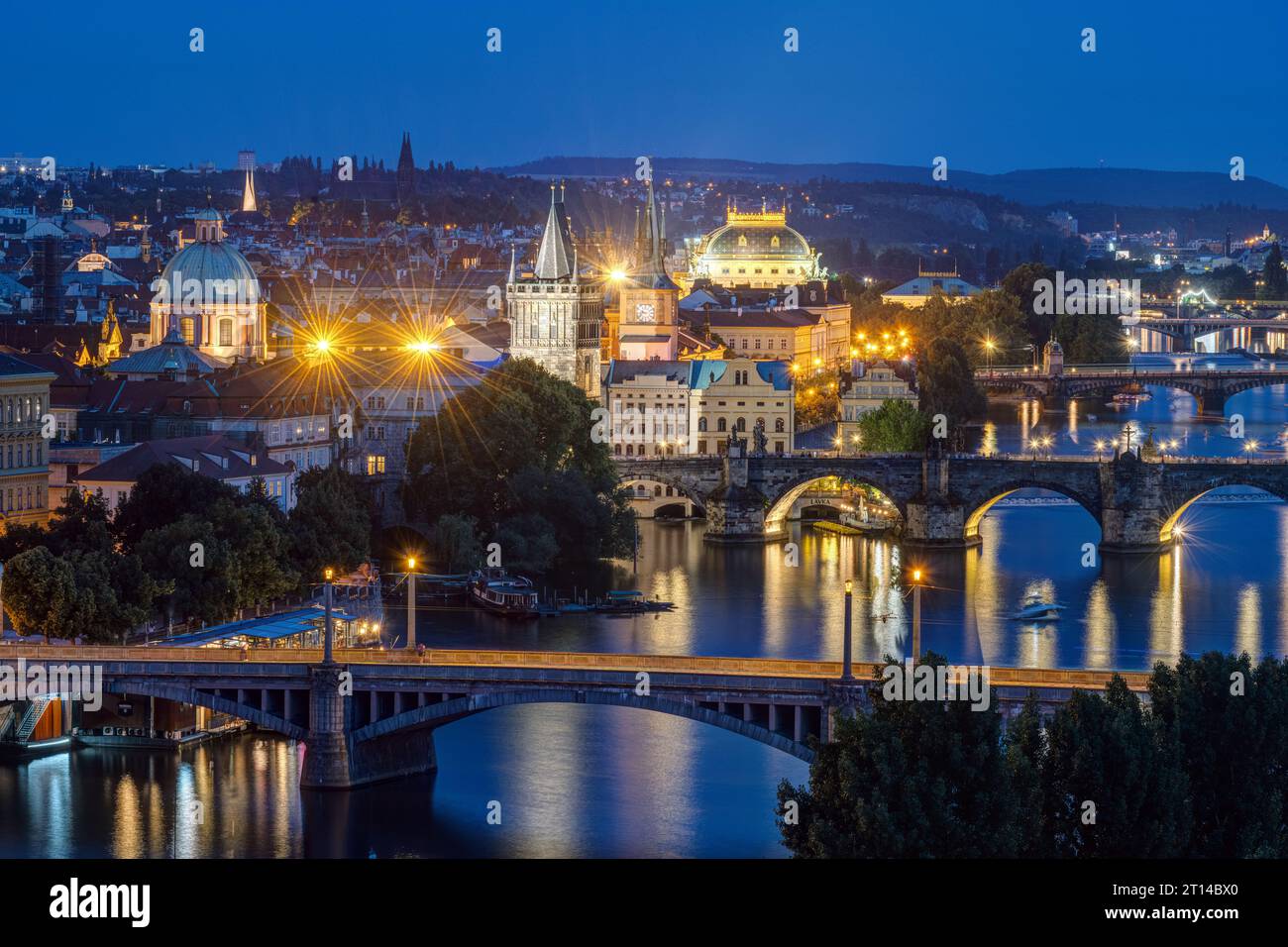 View of Prague with the bridges over the river Vltava at night Stock ...
