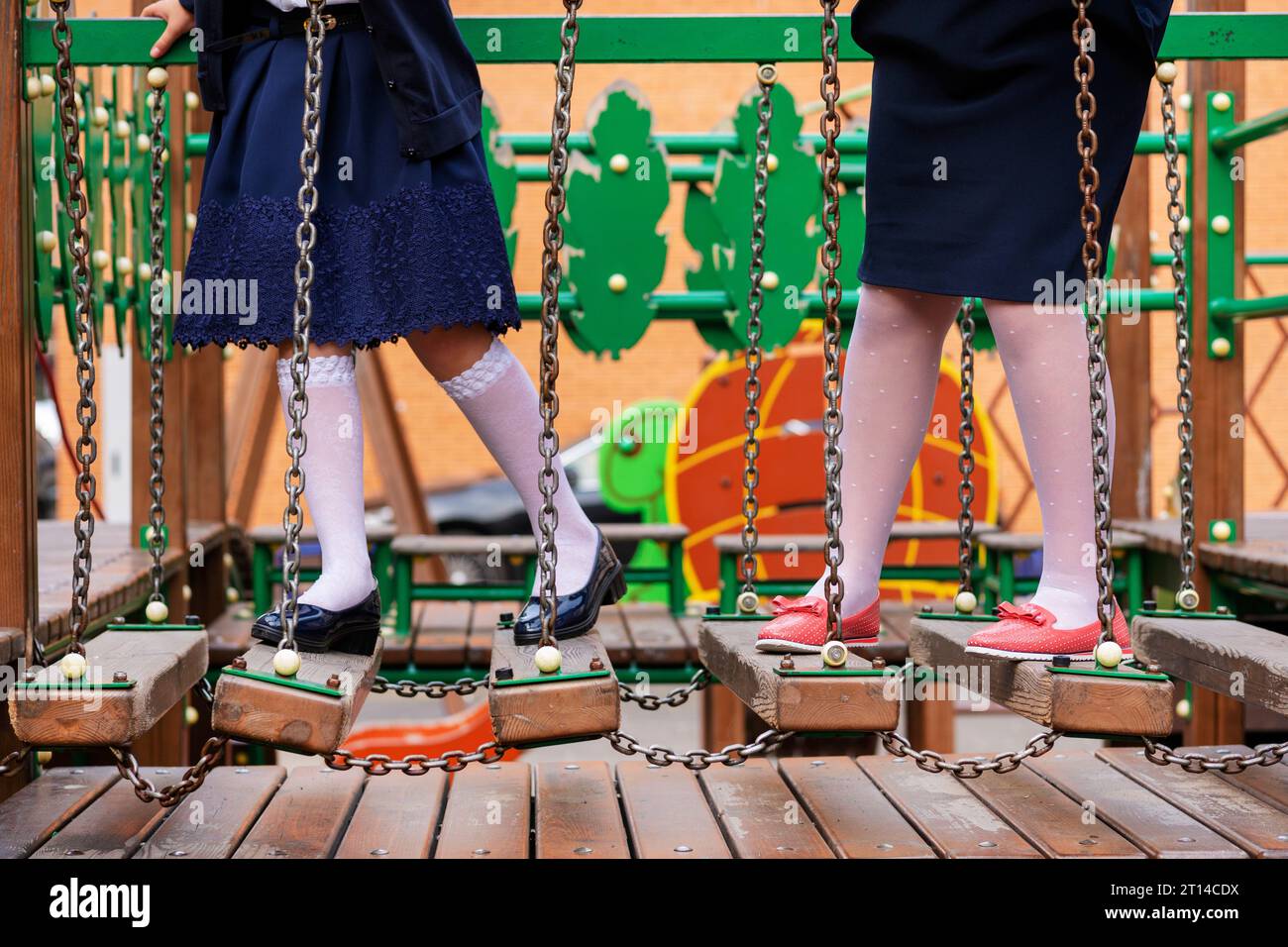 Schoolgirls. schoolgirl feet. Concept school days Stock Photo - Alamy