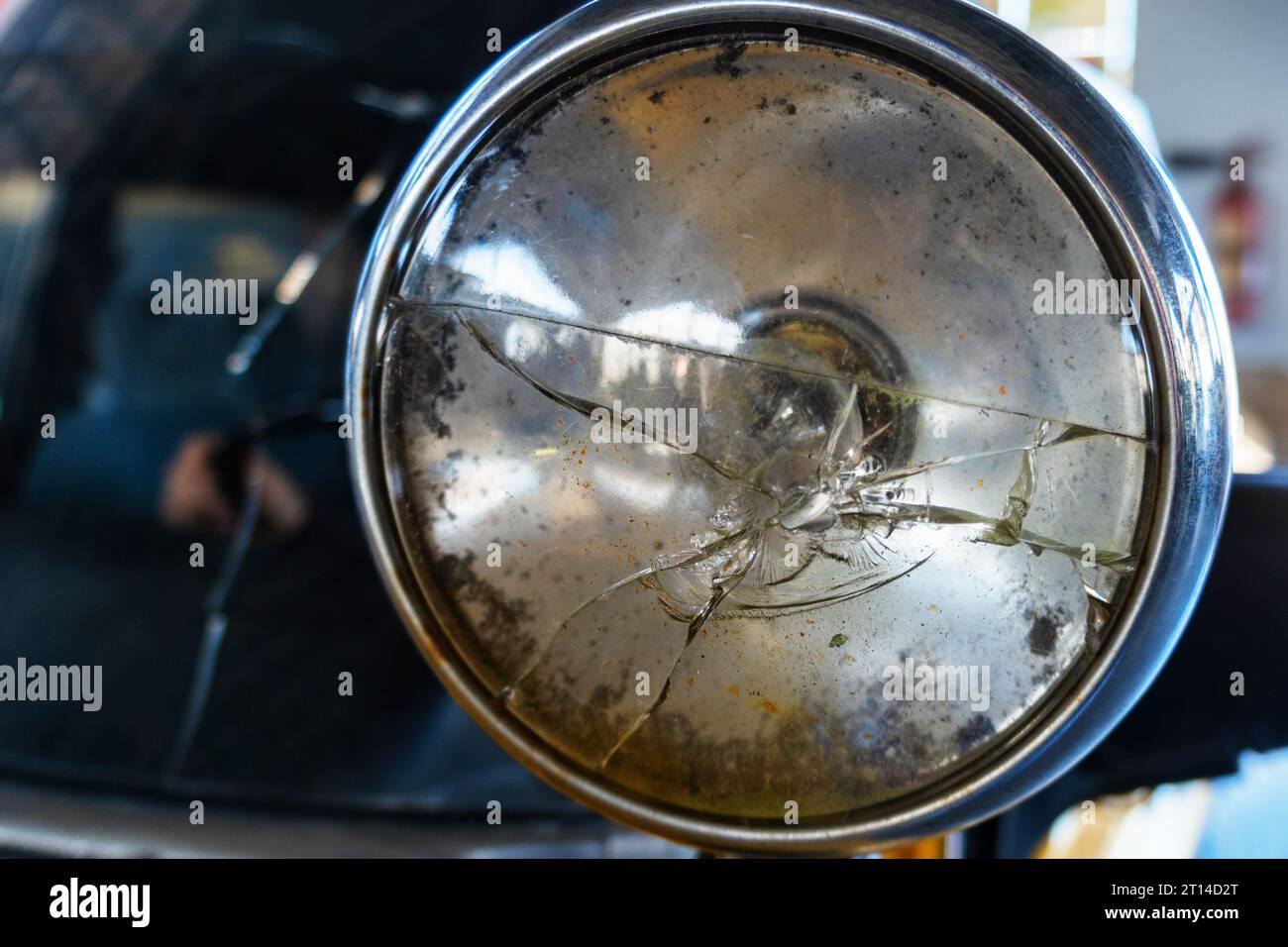 Broken car headlamp. Damaged automobile headlight after accident. The ...