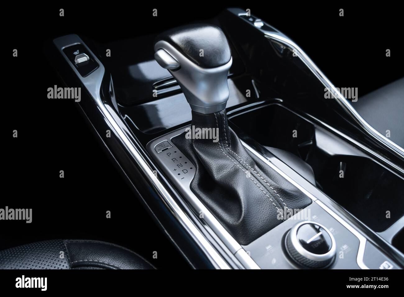 Automatic gear stick of a modern car. Modern car interior details ...