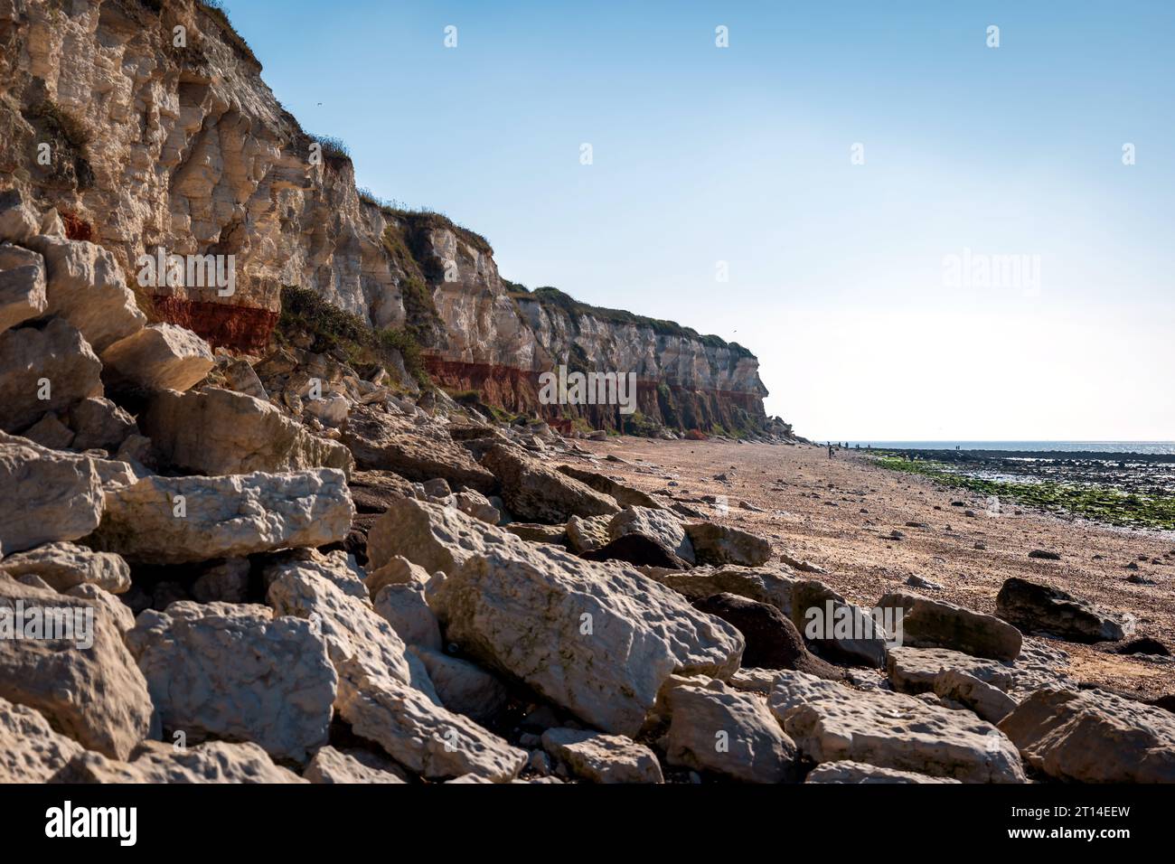 Colourful sandstone cliffs on british beach in england uk Stock Photo ...