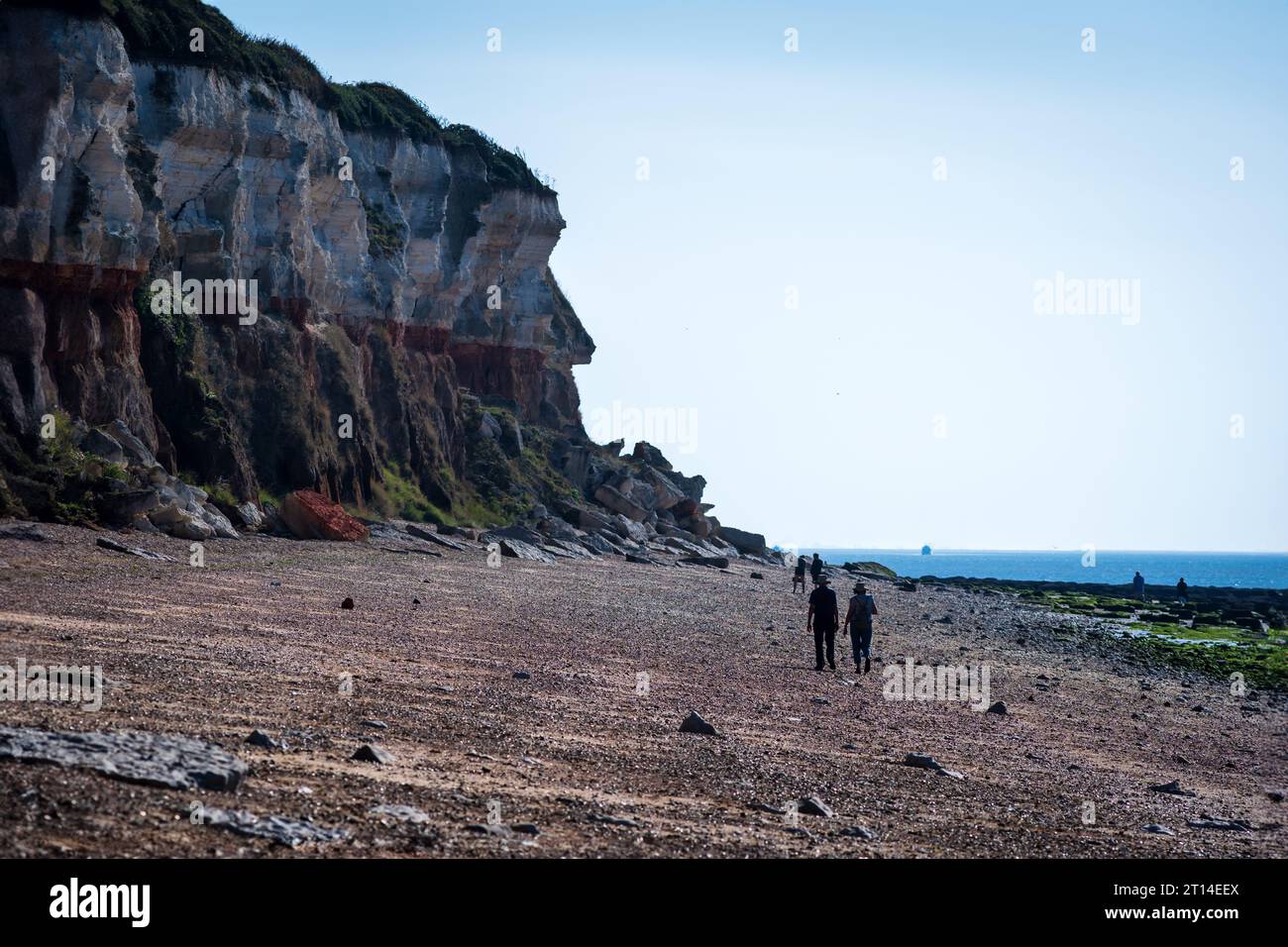 Colourful sandstone cliffs on british beach in england uk Stock Photo ...