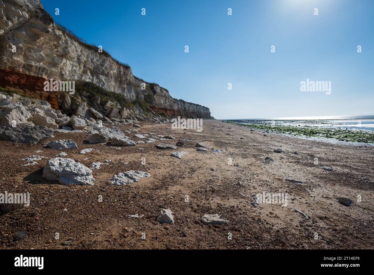 Colourful sandstone cliffs on british beach in england uk Stock Photo ...