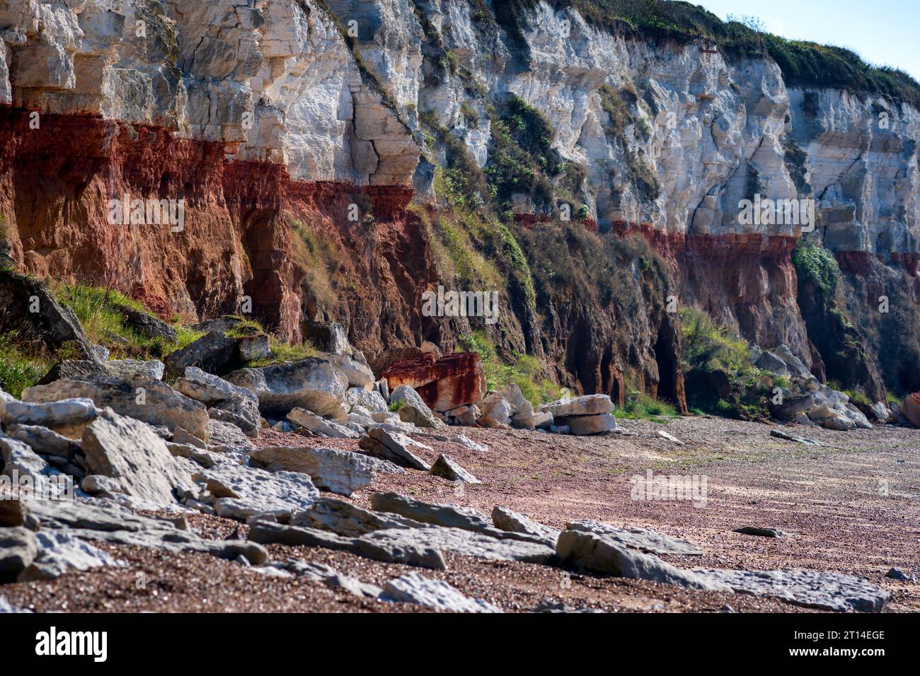 Colourful sandstone cliffs on british beach in england uk Stock Photo ...