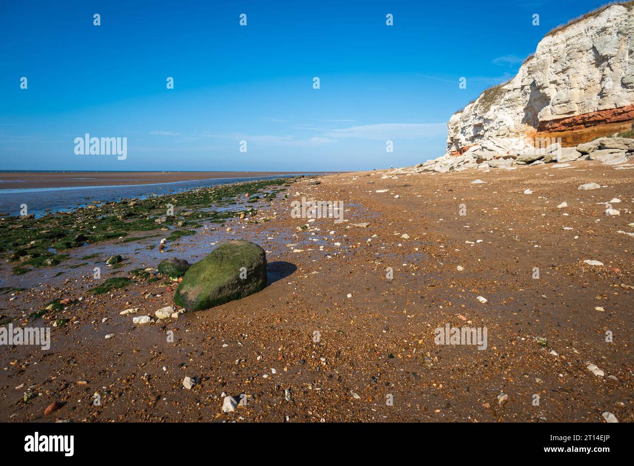 Colourful sandstone cliffs on british beach in england uk Stock Photo ...