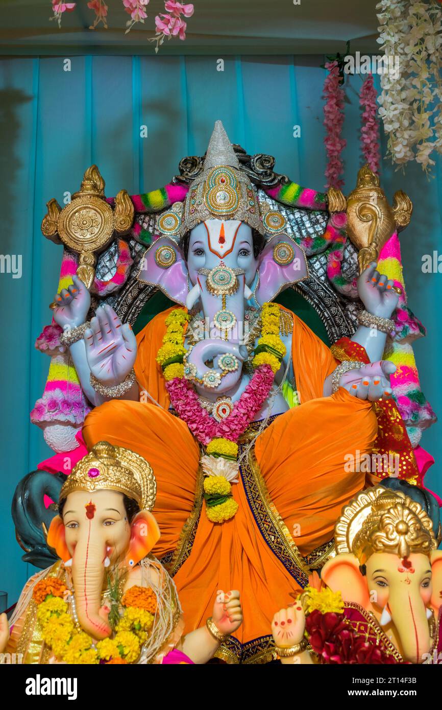 A beautiful idol of Lord Ganesha being worshipped at a mandal in Mumbai ...