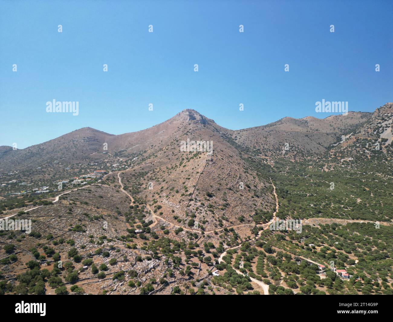 An aerial view of rolling hills and valleys in Crete island, Greece ...